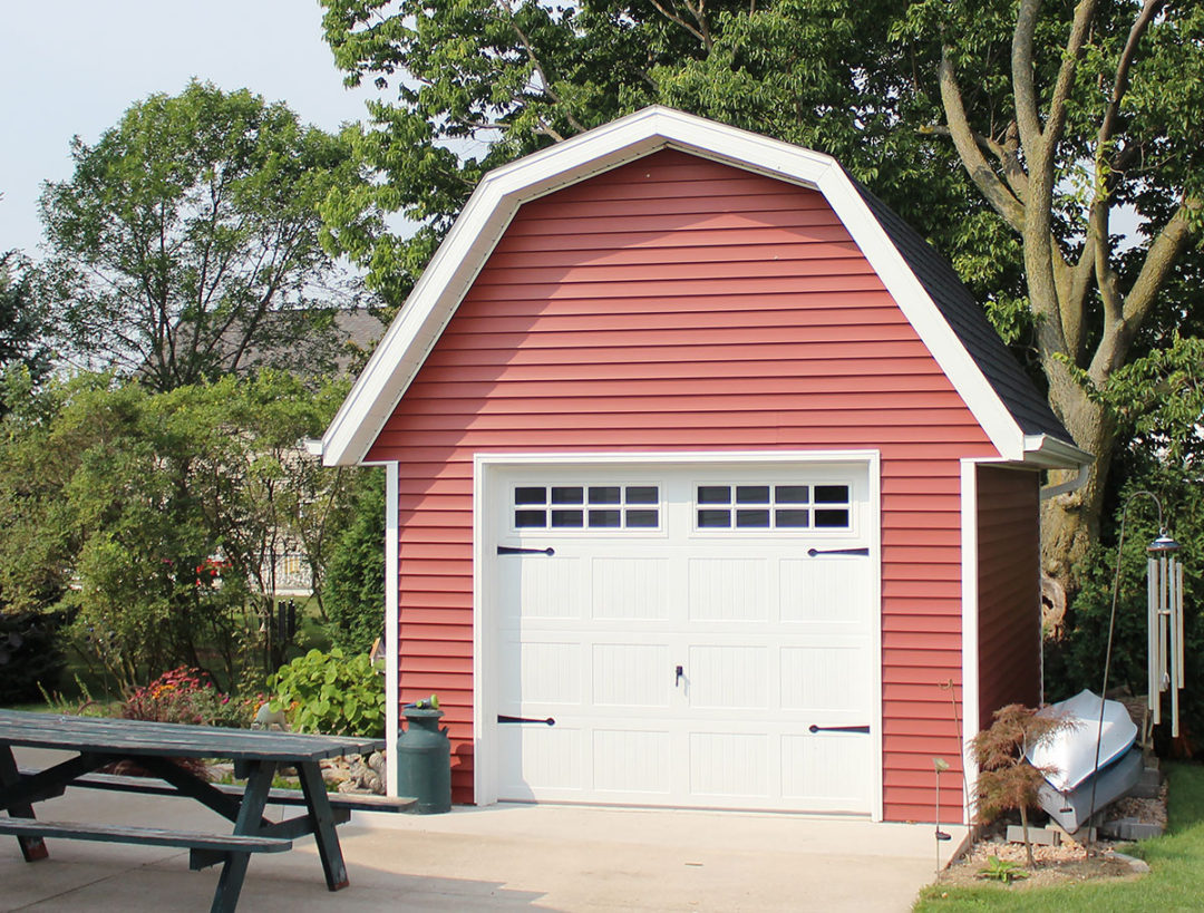 Red detached, single stall garage / shed • PortSide Builders