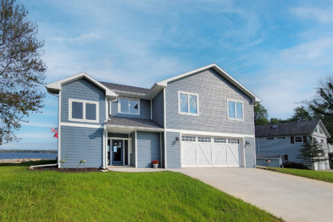 Two-Story Home with Ease of Outdoor - Indoor Living • PortSide Builders